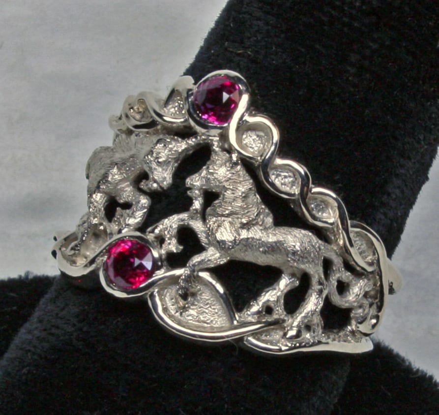 Double Unicorn Ruby Ring, magic white gold and fine rubies.