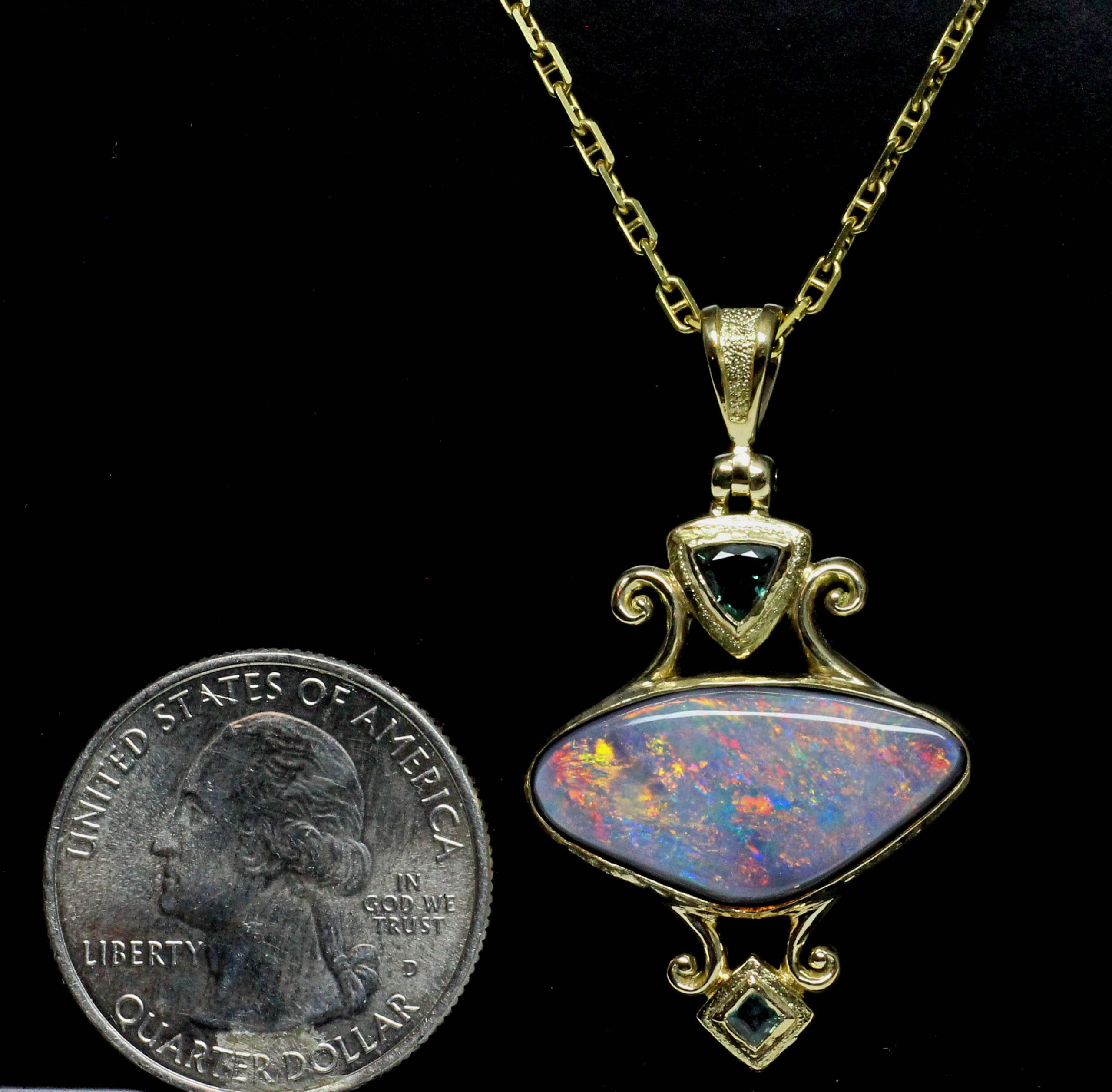 Black opal and Russian alexandrite pendant, in 18k