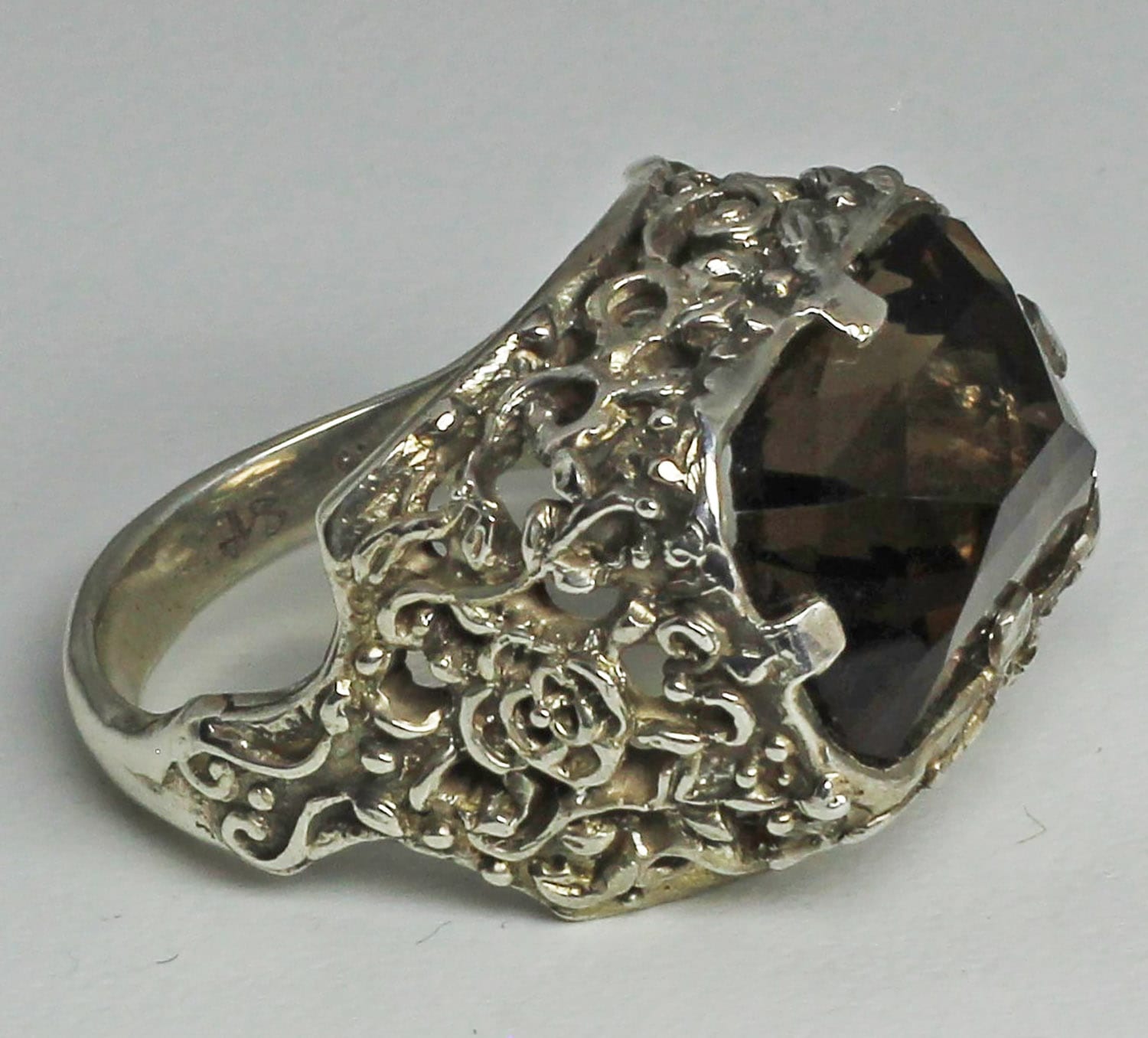 Tudor Bishops Ring size 9. set with a faceted smoky quartz