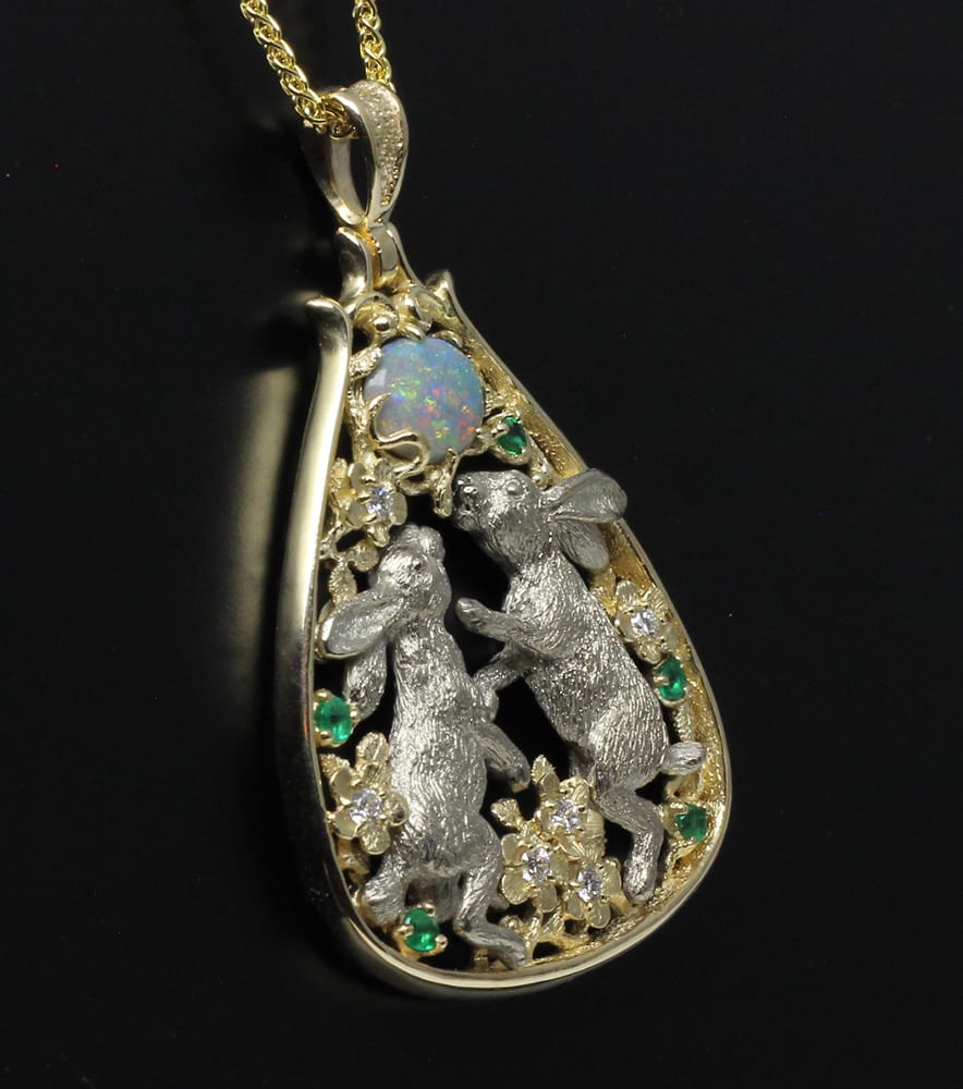 Dancing White Rabbits Pendant, Black opal, & precious stones