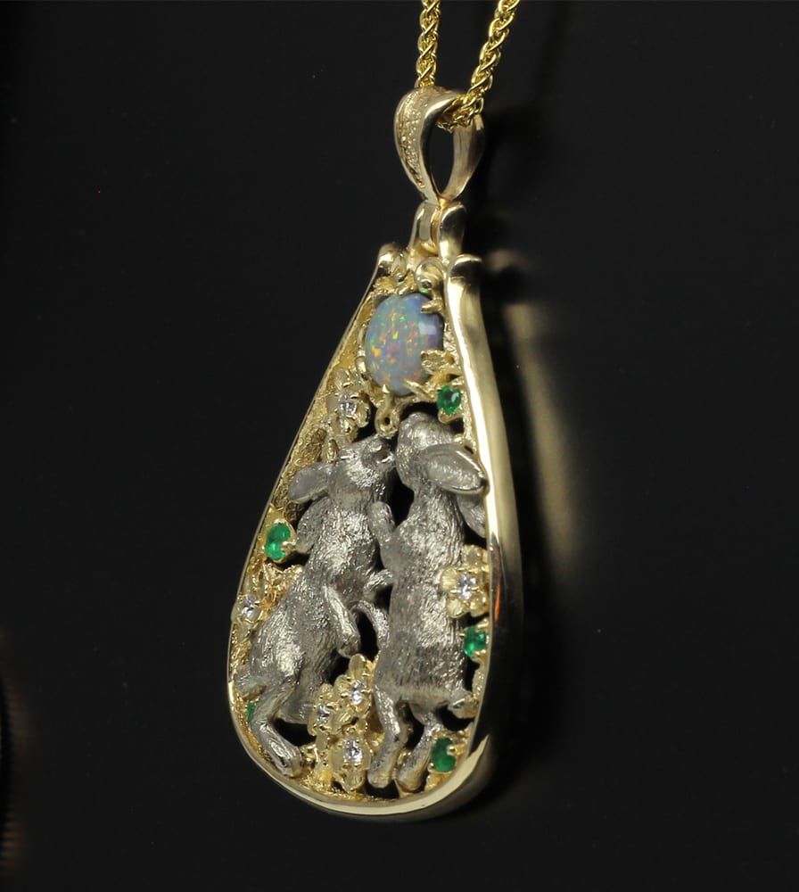 Dancing White Rabbits Pendant, Black opal, & precious stones